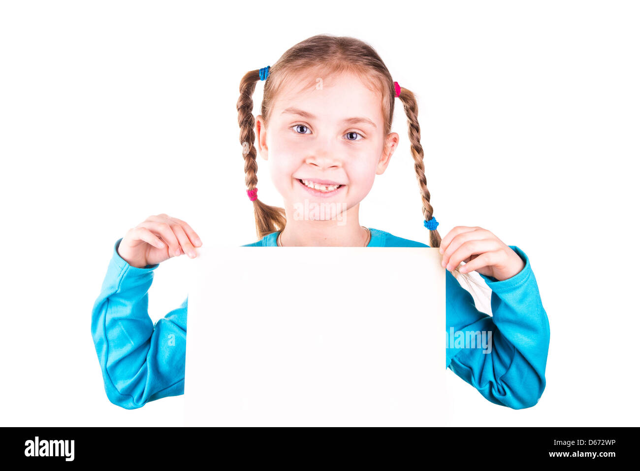 Smiling little girl holding an empty white card for you sample text ...