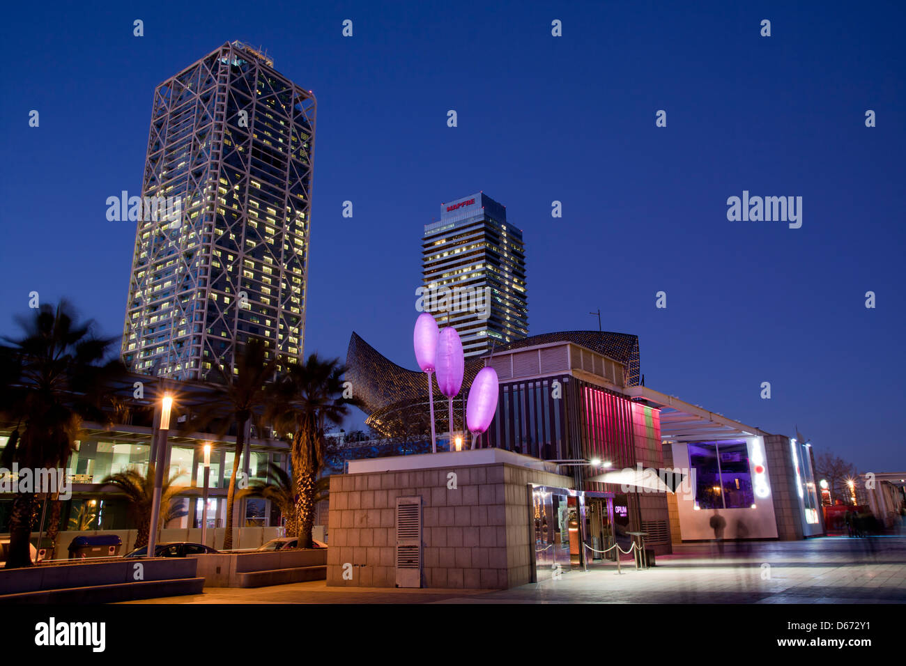 Arts Hotel and Tower Mapfre at night in Barcelona, Spain Stock Photo ...