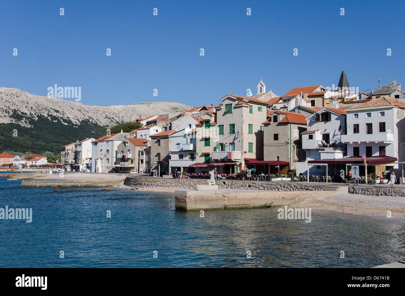 Baska town on the Croatian island Krk in the Mediterranean. Houses ...