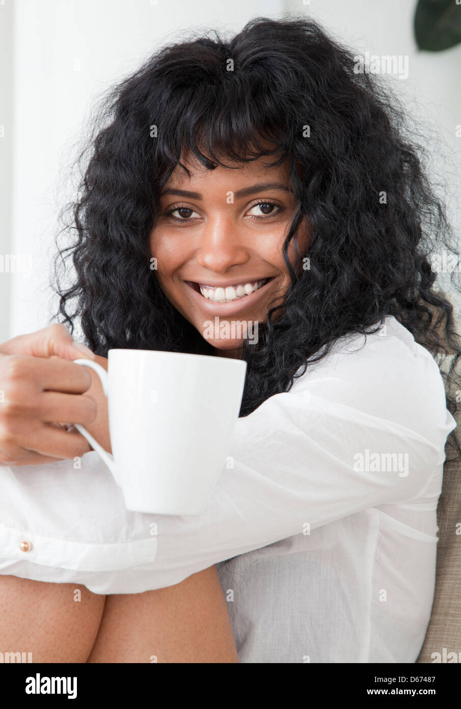 Woman with a coffee Stock Photo - Alamy