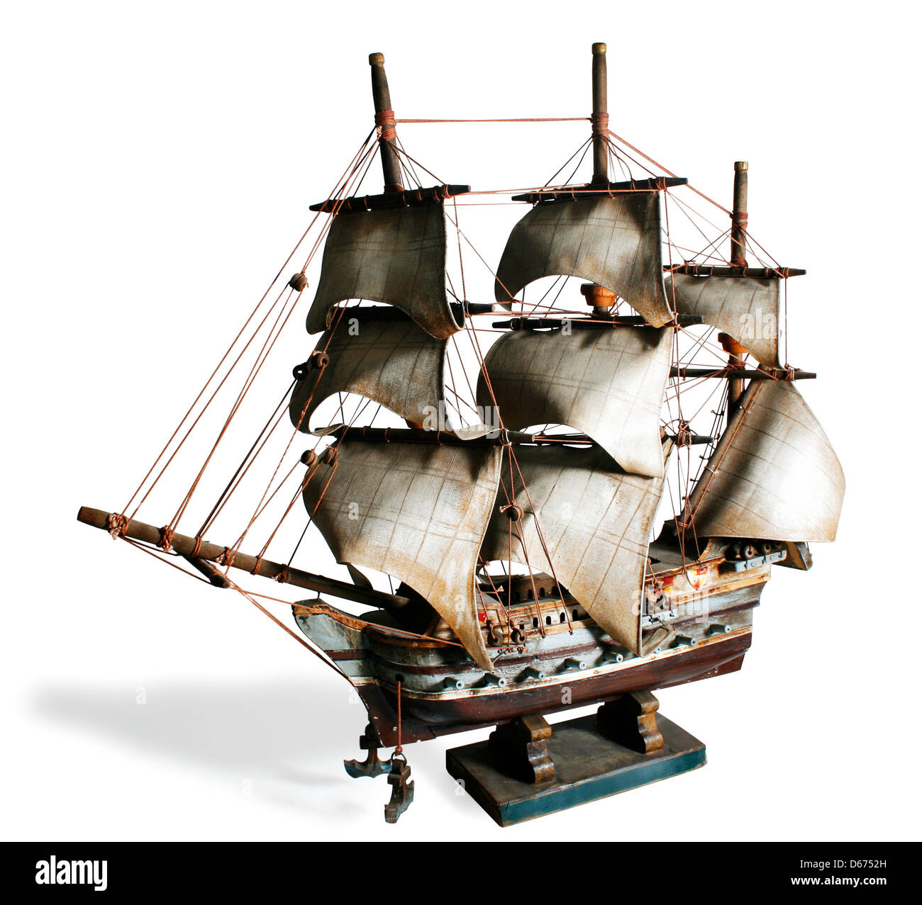 Old model of a sail boat in a white background Stock Photo - Alamy