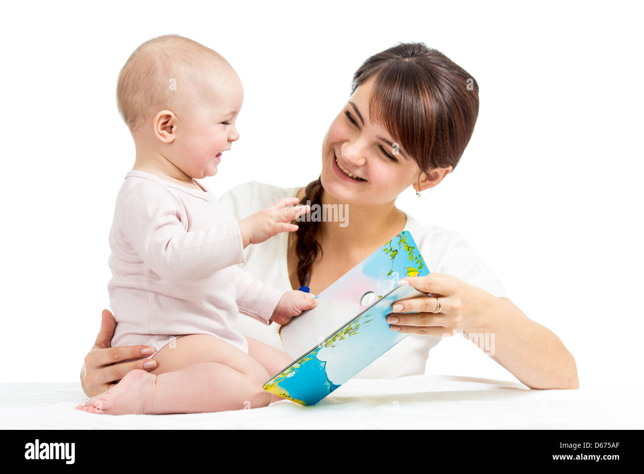 happy mother reading a book to child Stock Photo - Alamy