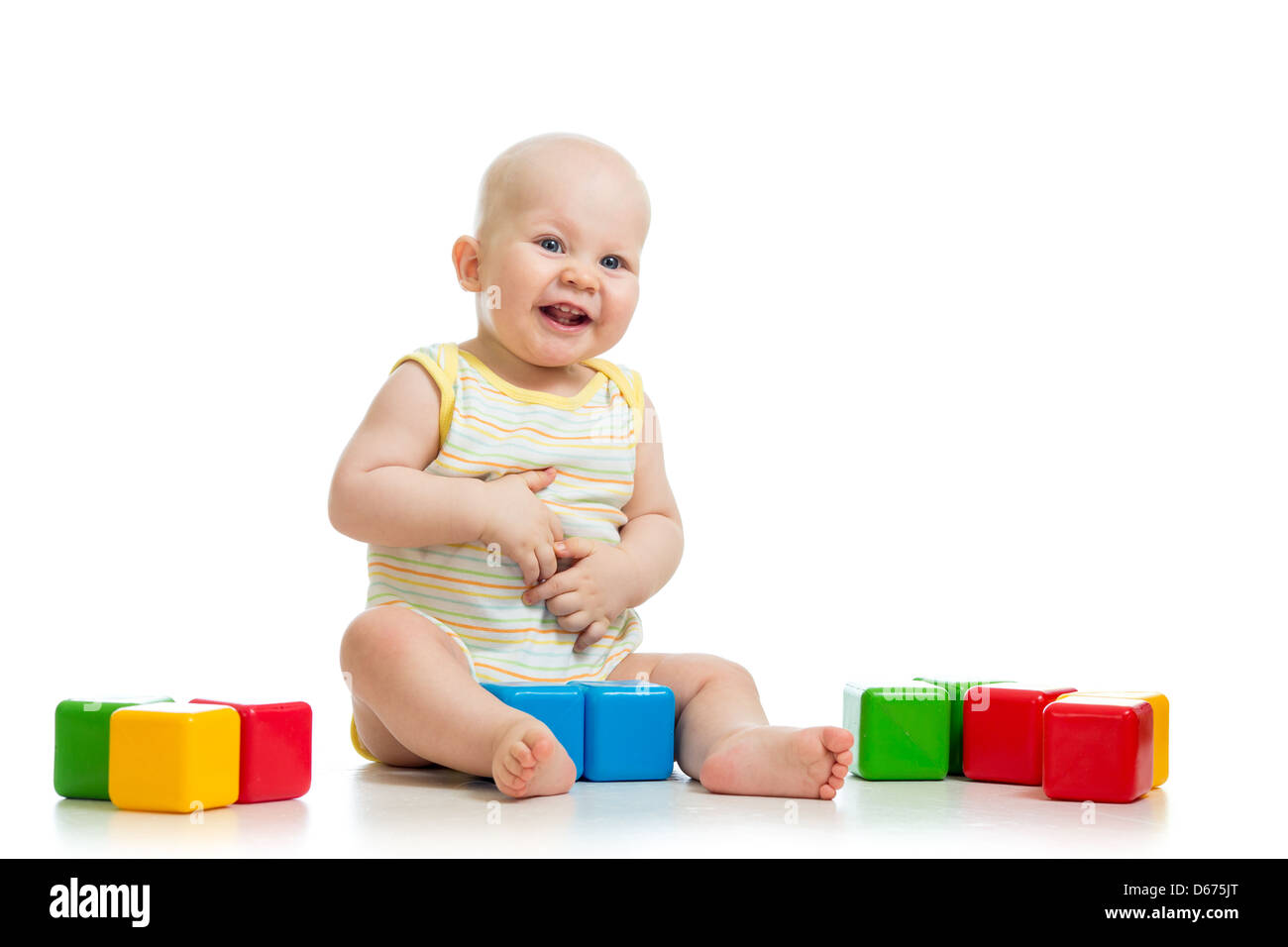 smiling child playing with colorful building blocks or bricks Stock ...