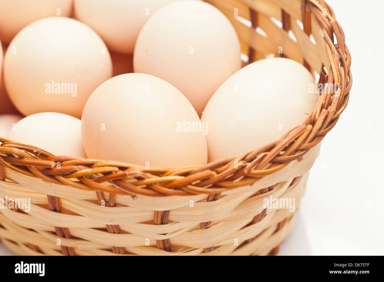 Eggs in basket Stock Photo - Alamy