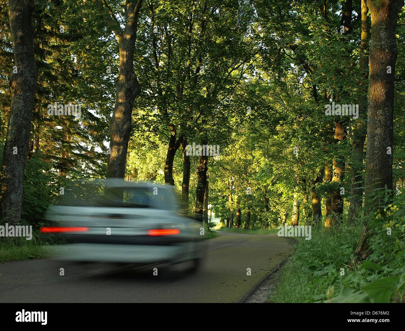 motion blur car on country road Stock Photo - Alamy