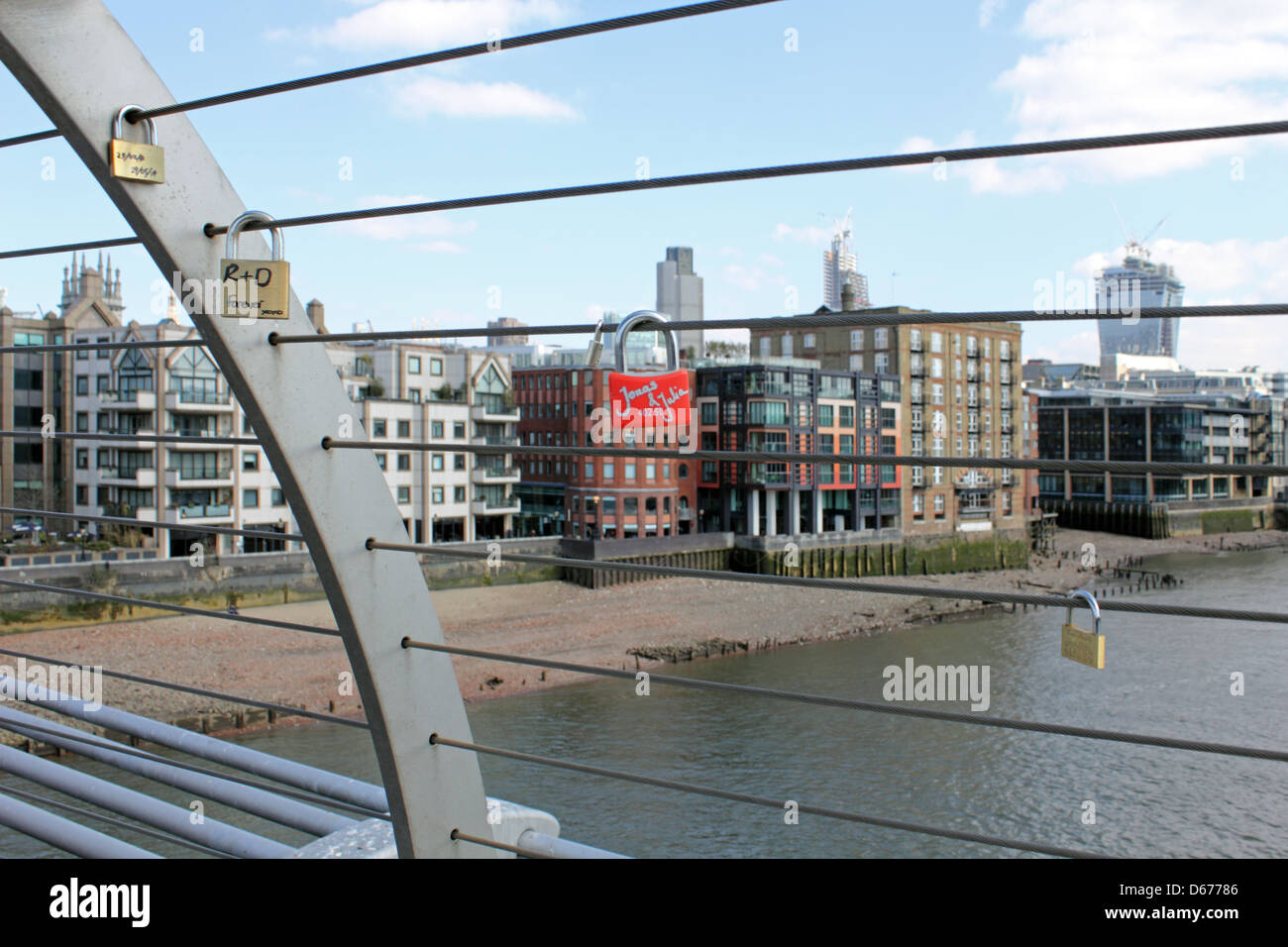 Love locks on the Millennium bridge London England UK Stock Photo - Alamy