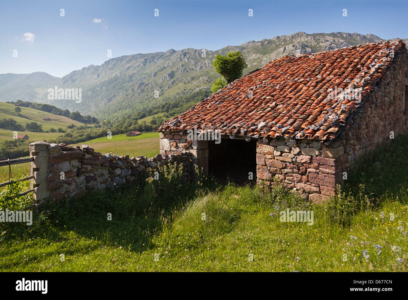Farm building in high meadows in the Picos de Europa, northern Spain ...