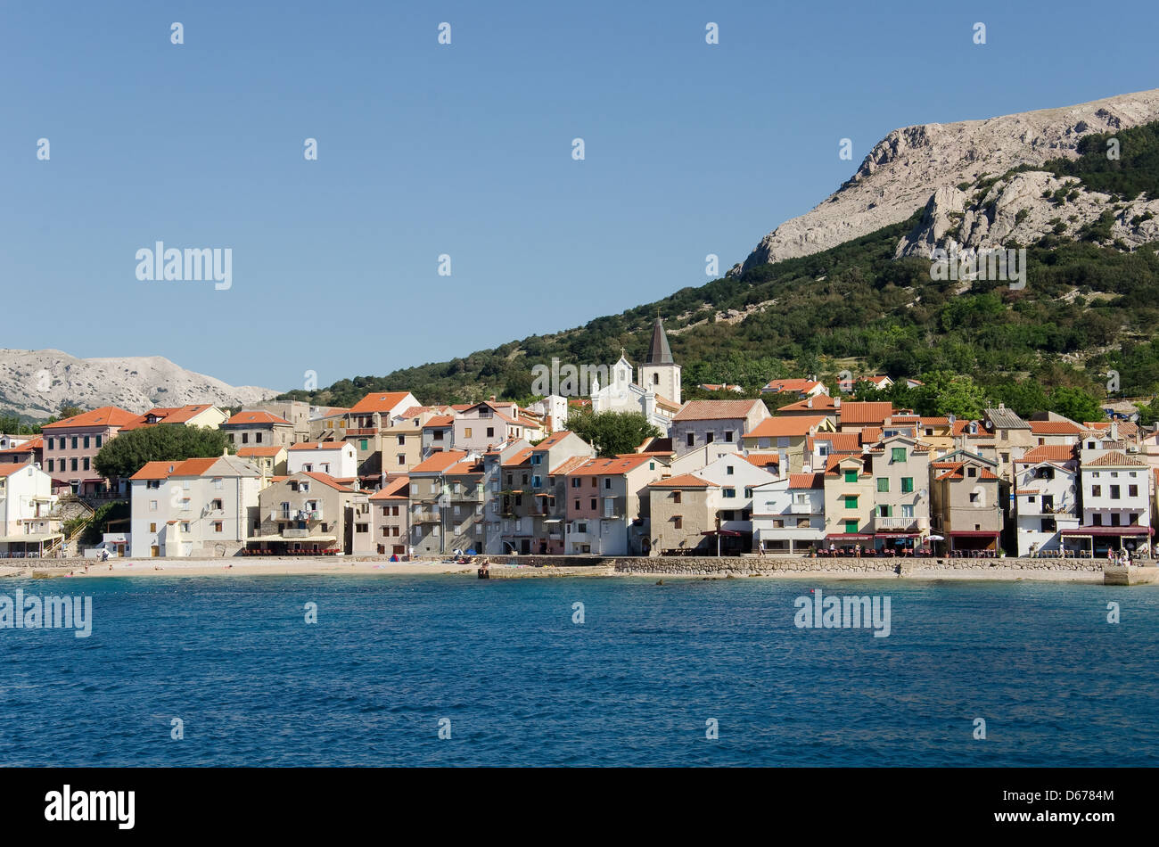 Baska town on the Croatian island Krk in the Mediterranean. Houses ...