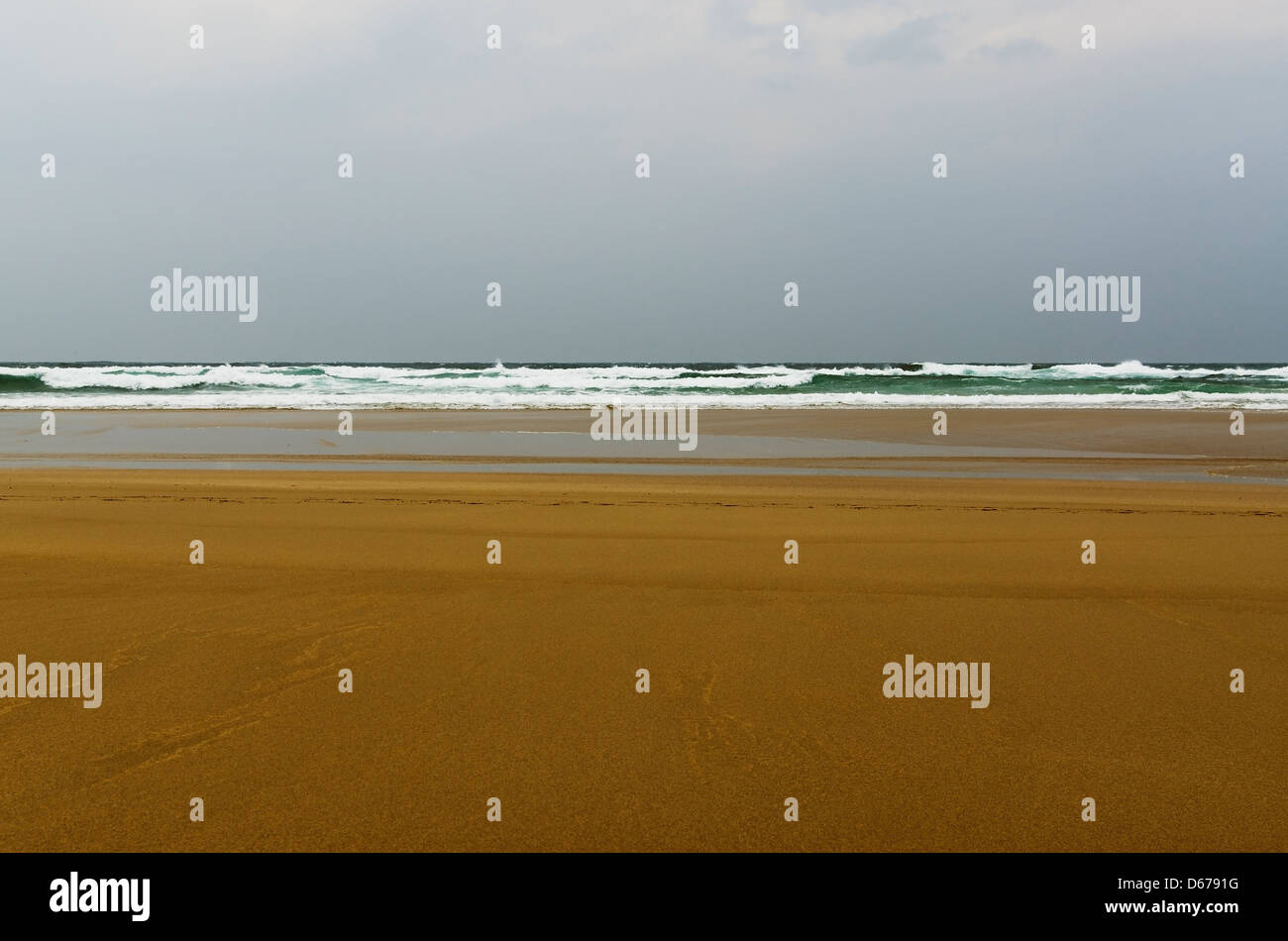 landscape lonely beach day with cloudy sky Stock Photo - Alamy