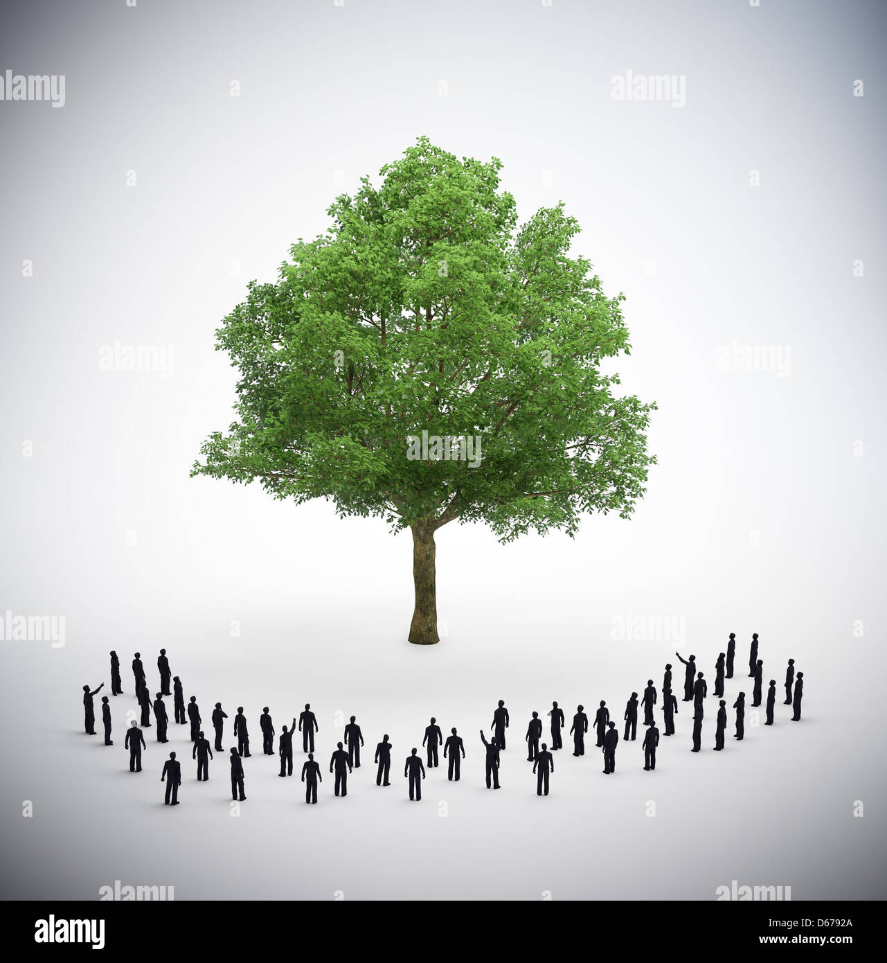 Group of people standing around a large tree Stock Photo - Alamy