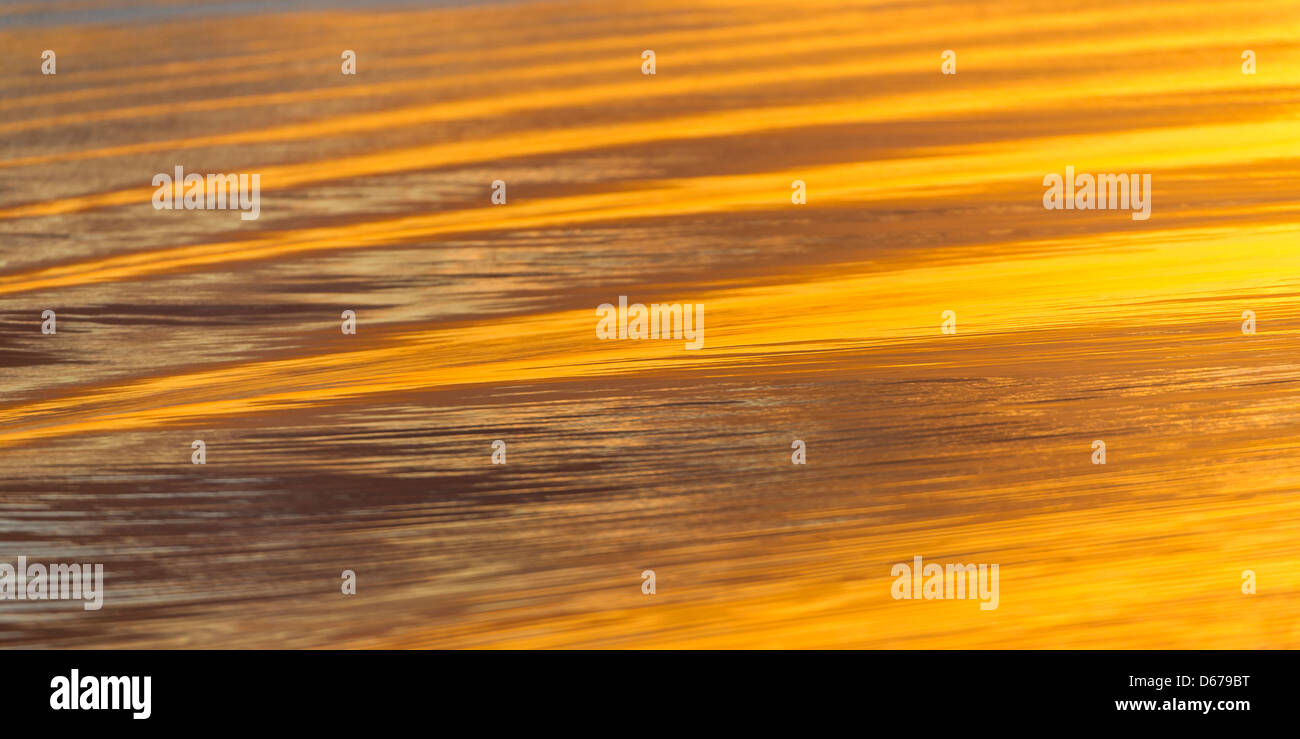 Sunset water waves hi-res stock photography and images - Alamy
