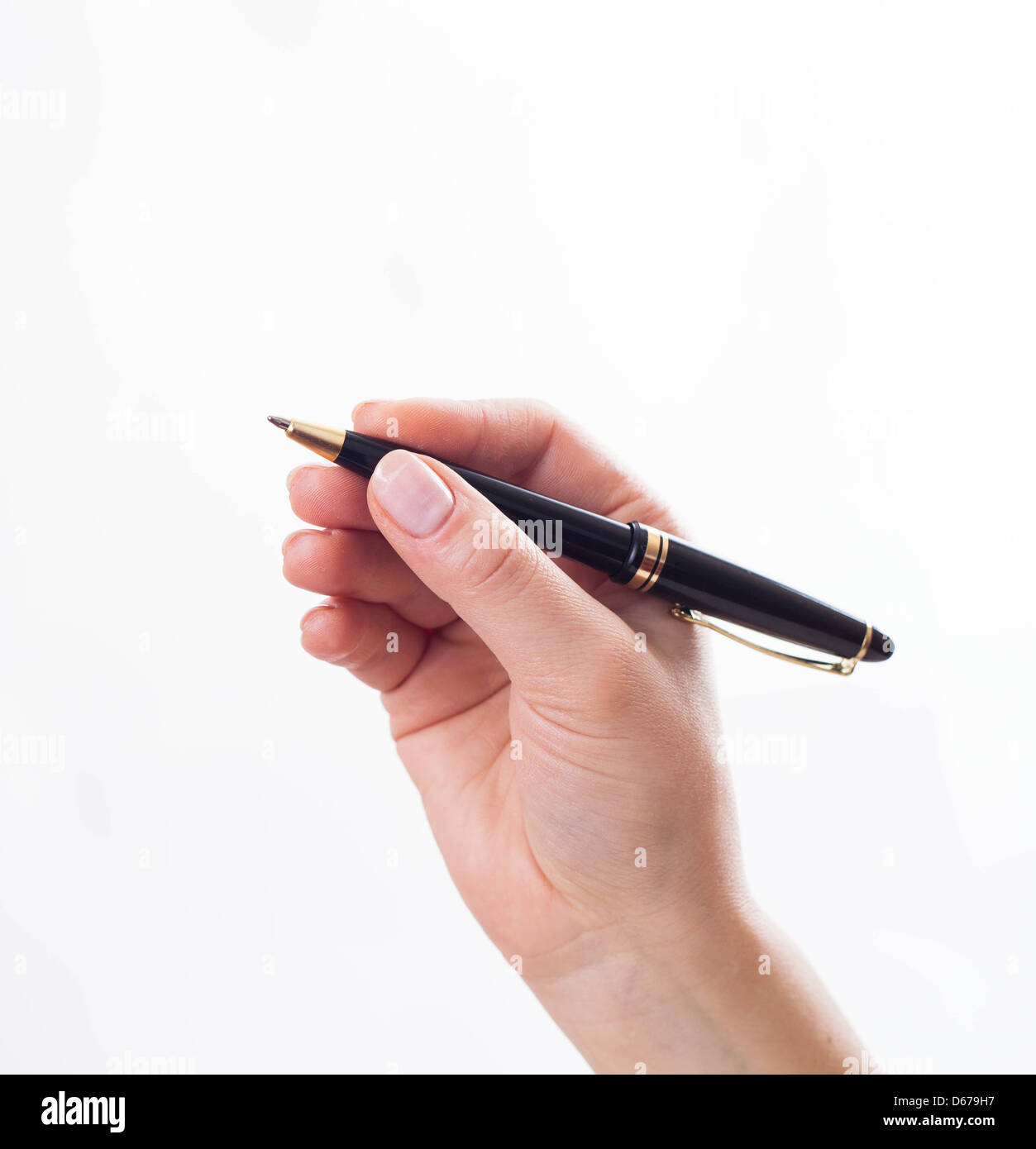 Isolated female hand is ready for writing Stock Photo - Alamy