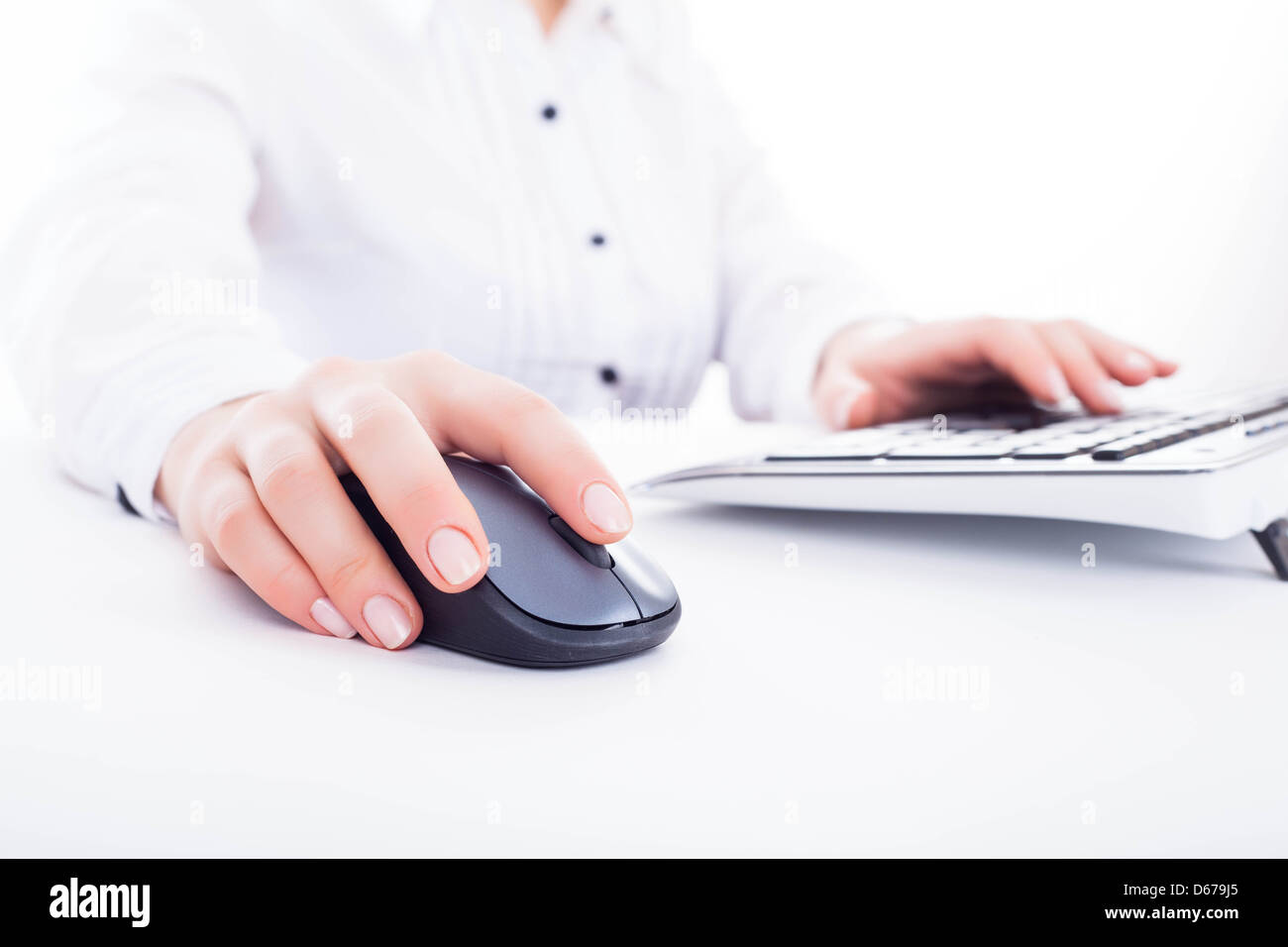 Hands on the keyboard and on the mouse Stock Photo - Alamy