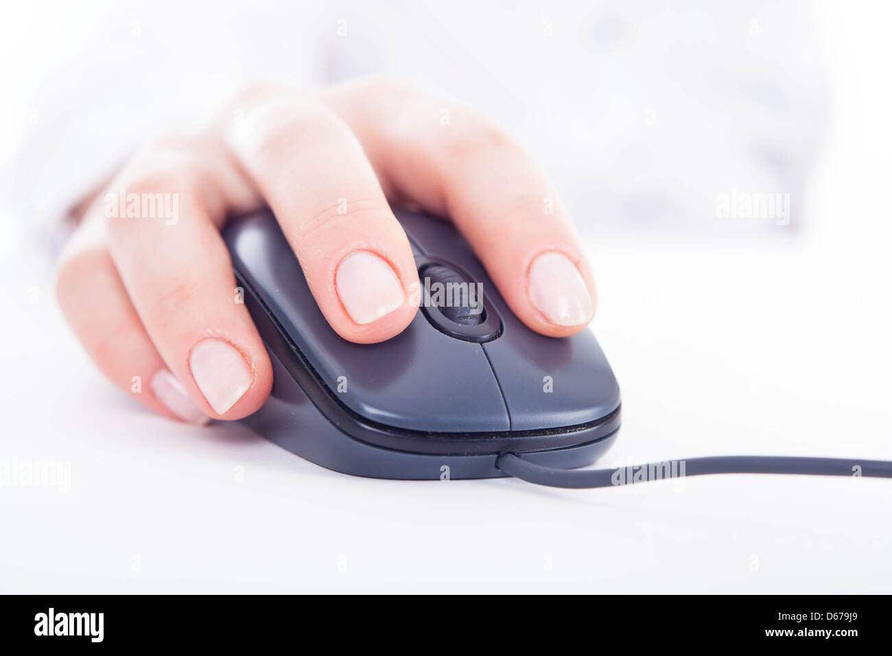 Isolated female hand on the mouse Stock Photo - Alamy