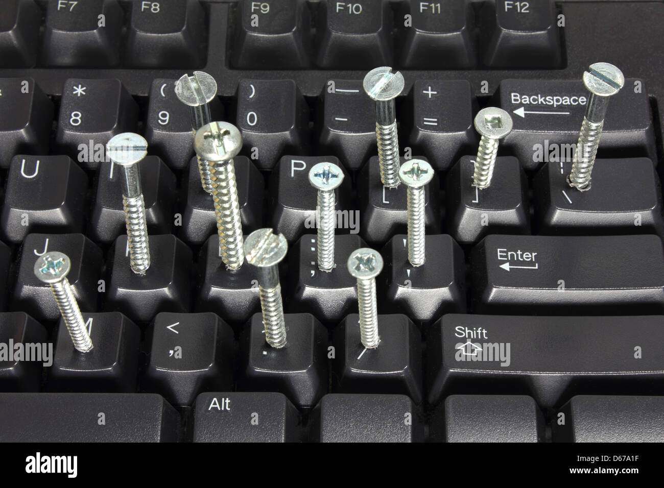 Computer Keyboard with Screws Stock Photo - Alamy