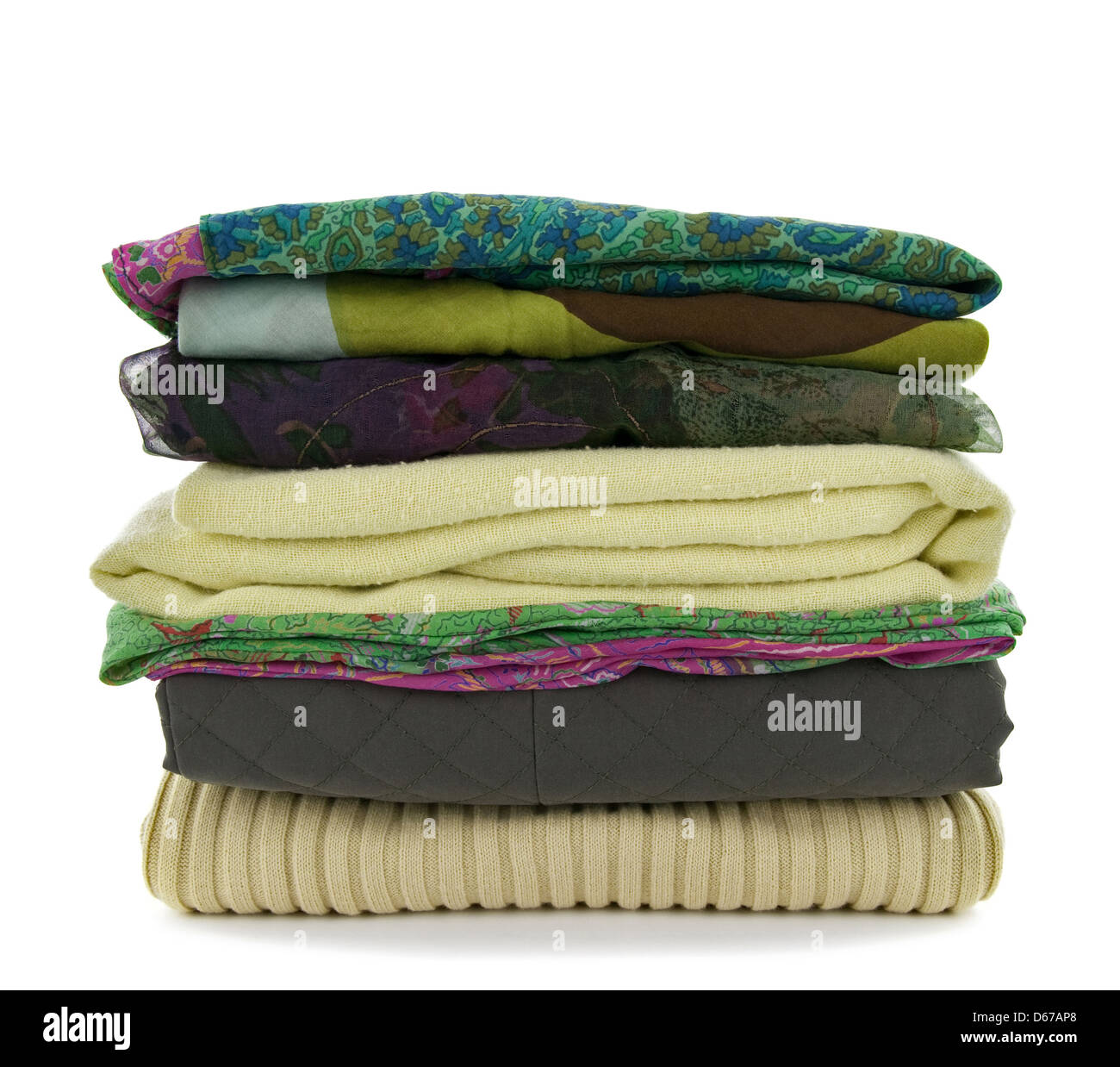 Pile of green casual clothes on white background Stock Photo - Alamy