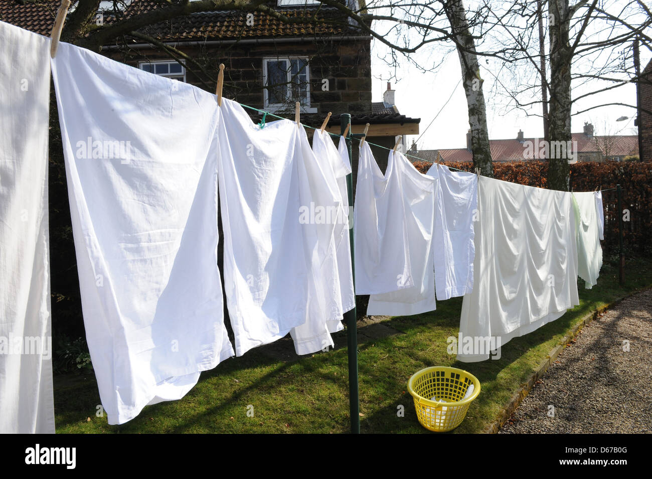 A line of washing on a washing line in a north yorkshire garden in ...