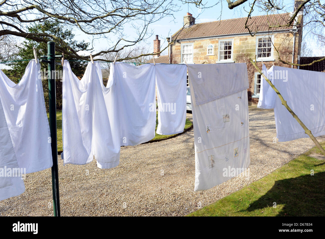 A line of washing on a washing line in a north yorkshire garden in ...