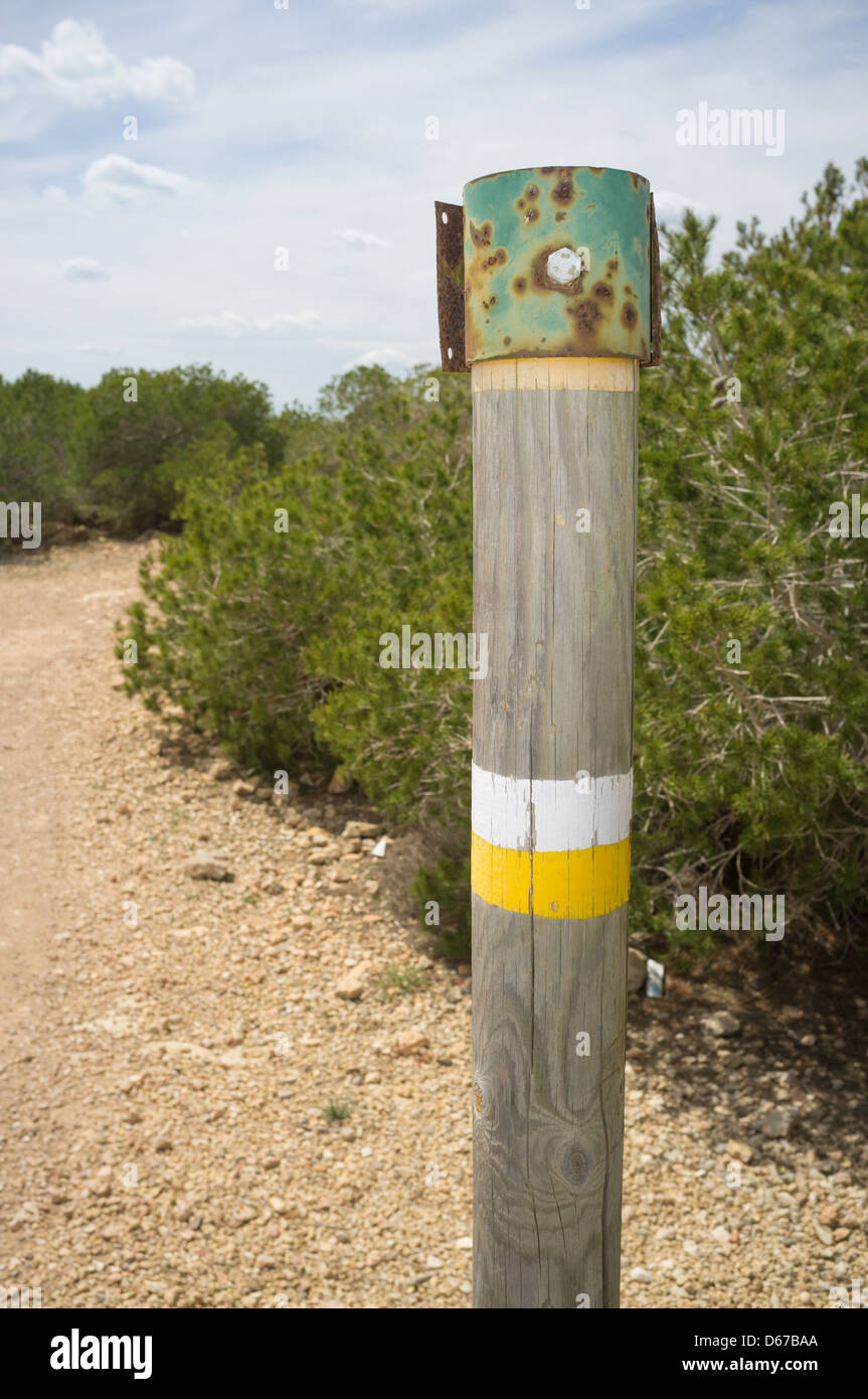 Wooden pole marking a hiking trail Stock Photo - Alamy
