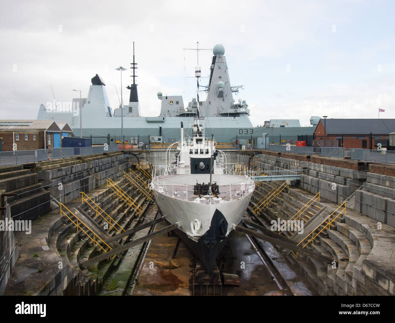 first world war warship M33 in dry dock at Portsmouth Historic Dockyard ...