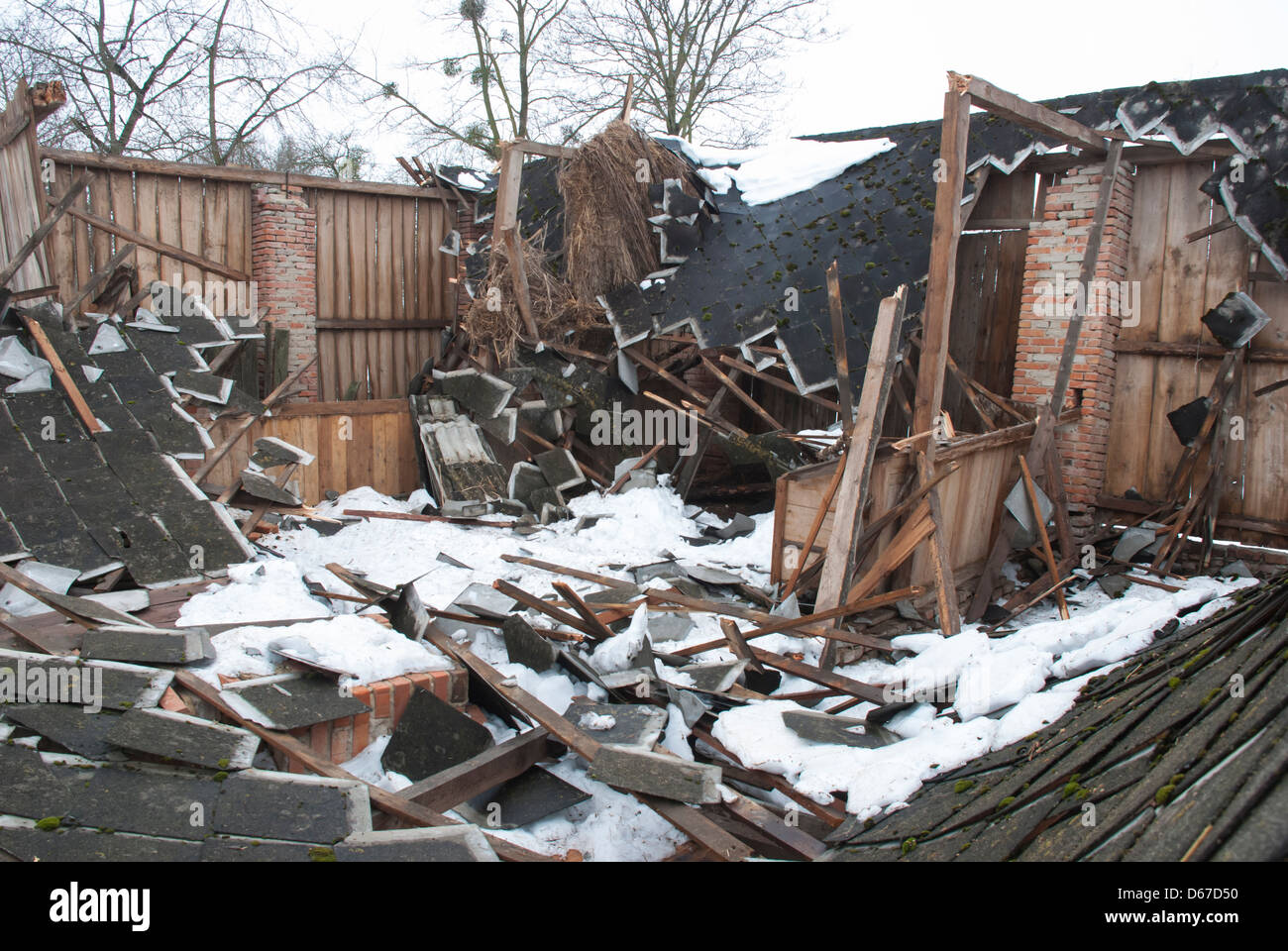 Collapsed roof house due to heavy snow Stock Photo - Alamy