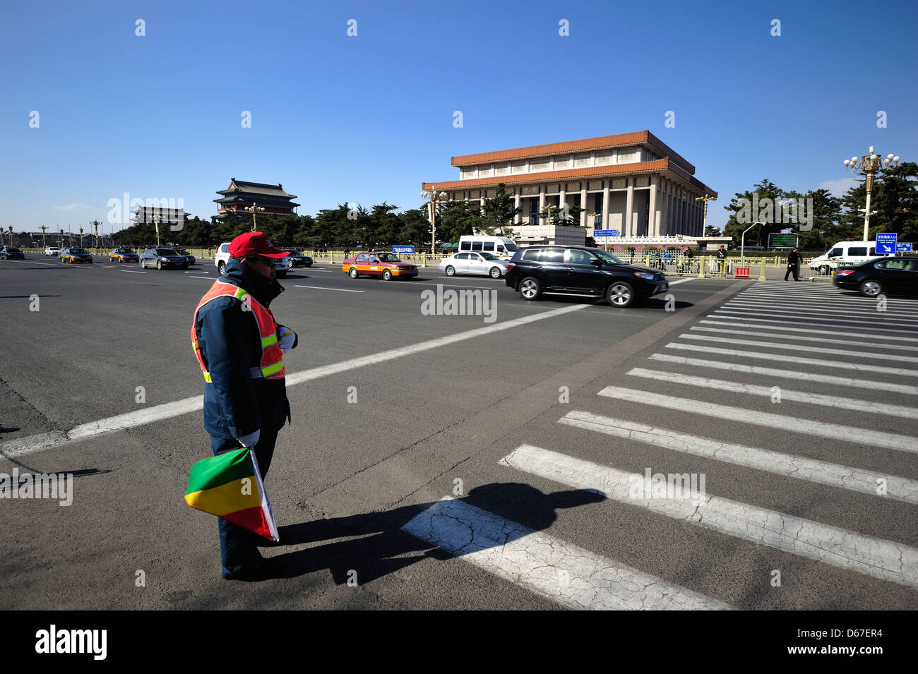 Beijing, China - April 1:Traffic officer guards the pedestrian crossing ...