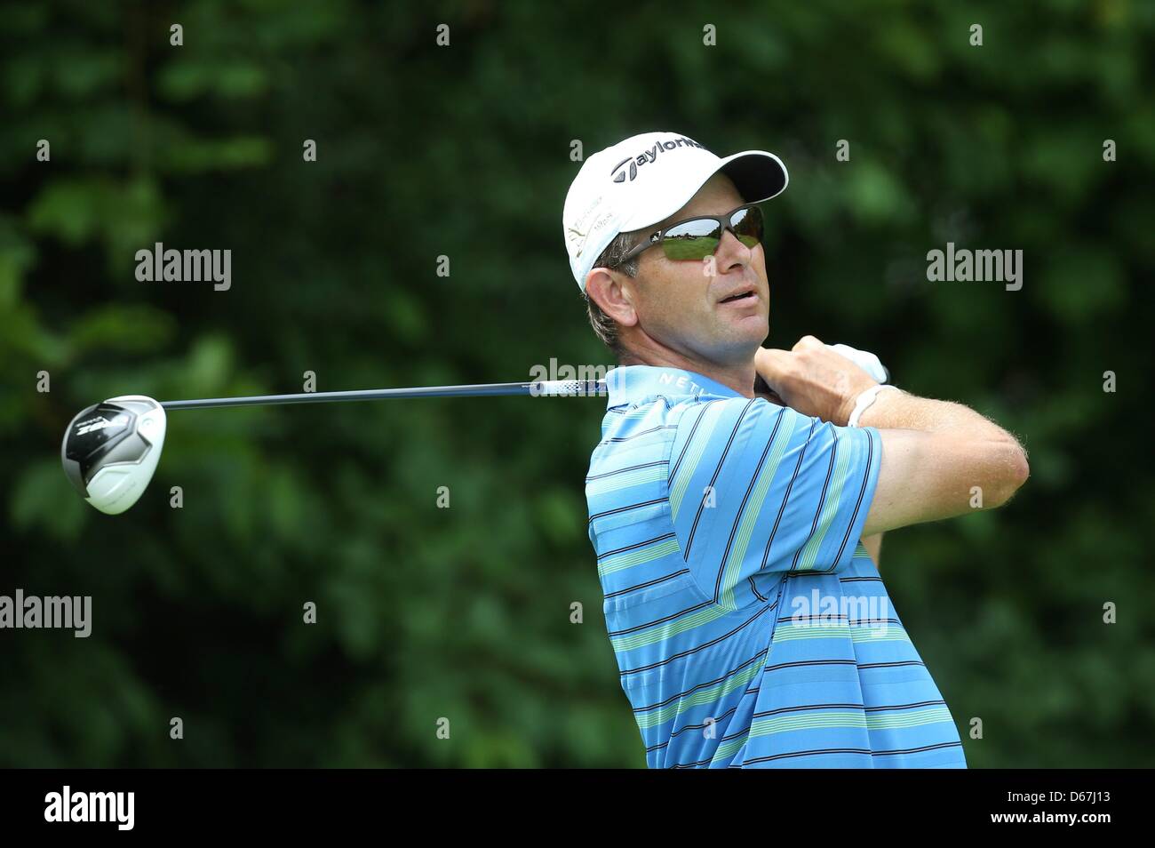South African golfer Retief Goosen strikes the ball during the ...