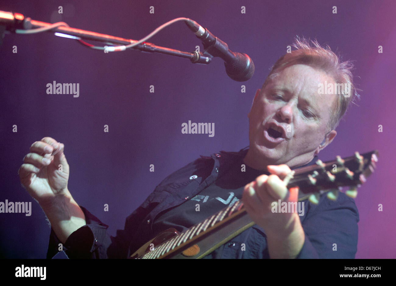 The frontman of the British band New Order, Bernhard Sumner, performs ...