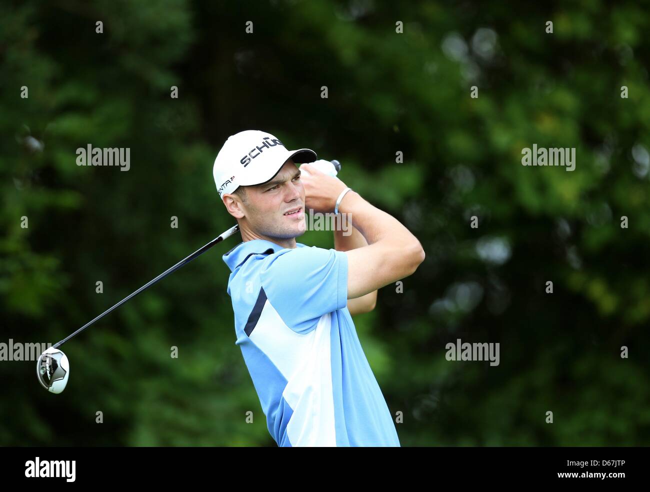 German golfer Martin Kaymer watches his shot during the International ...