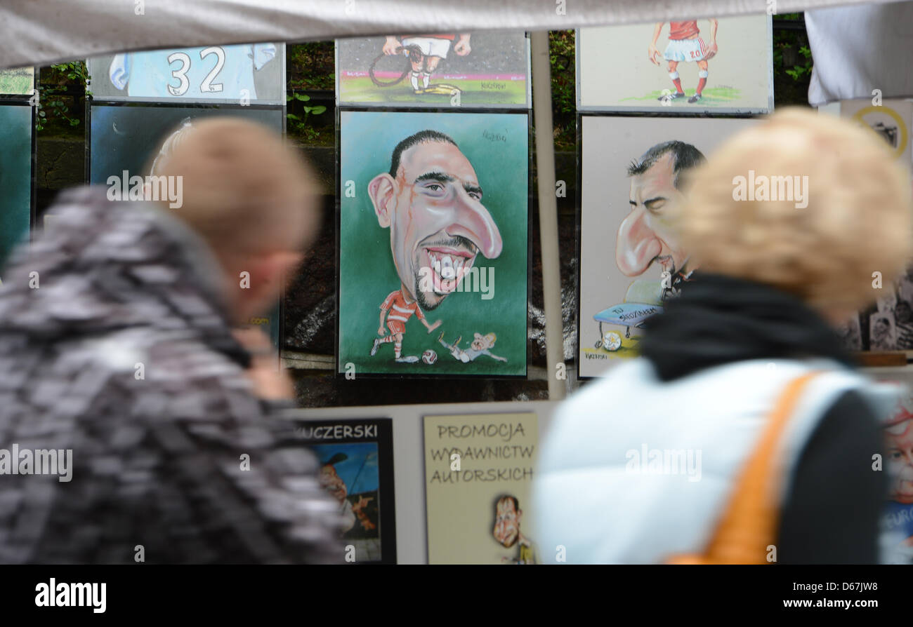 A cartoon of France's Franck Ribery is on display at a street artist in ...
