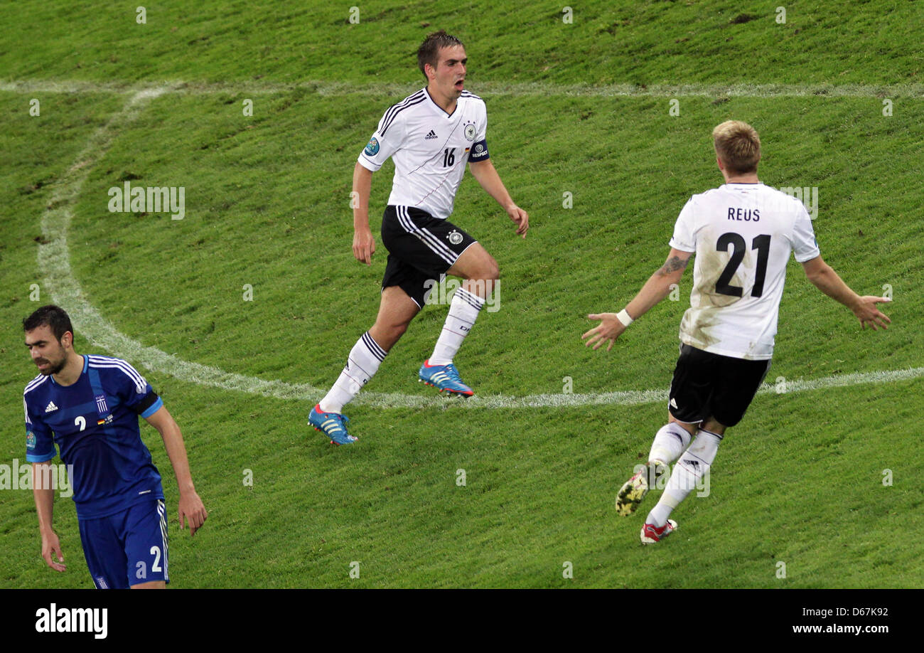 Germany's Philipp Lahm (C) celebrates with Marco Reus (R) after scoring ...