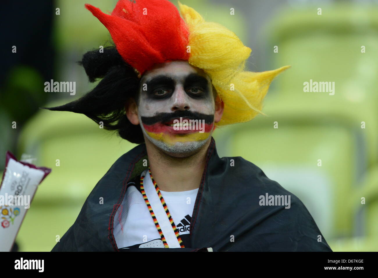 A German fan celebrates on the stand prior to the UEFA EURO 2012 ...
