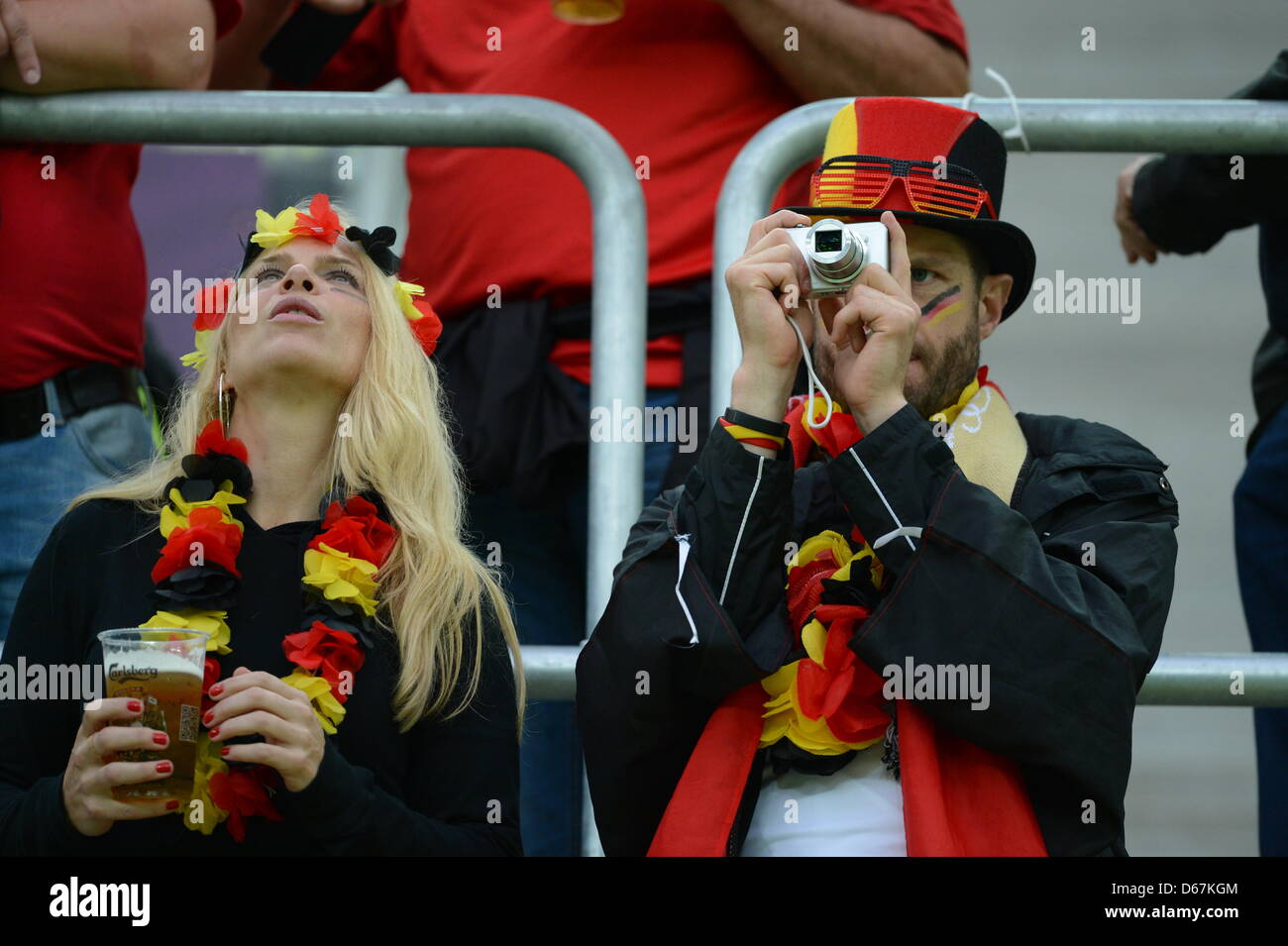 Two German fans prior to the UEFA EURO 2012 quarter-final soccer match ...