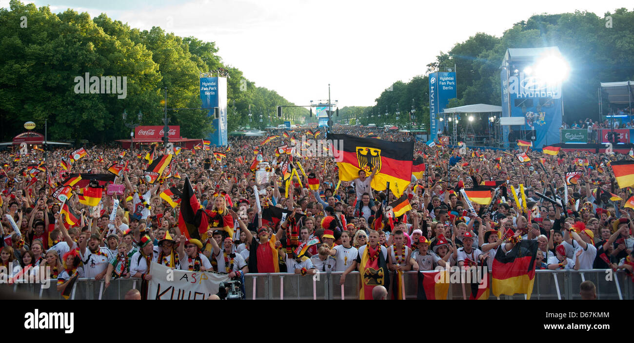 Soccer fans watch the UEFA EURO 2012 quarter final soccer match Germany ...