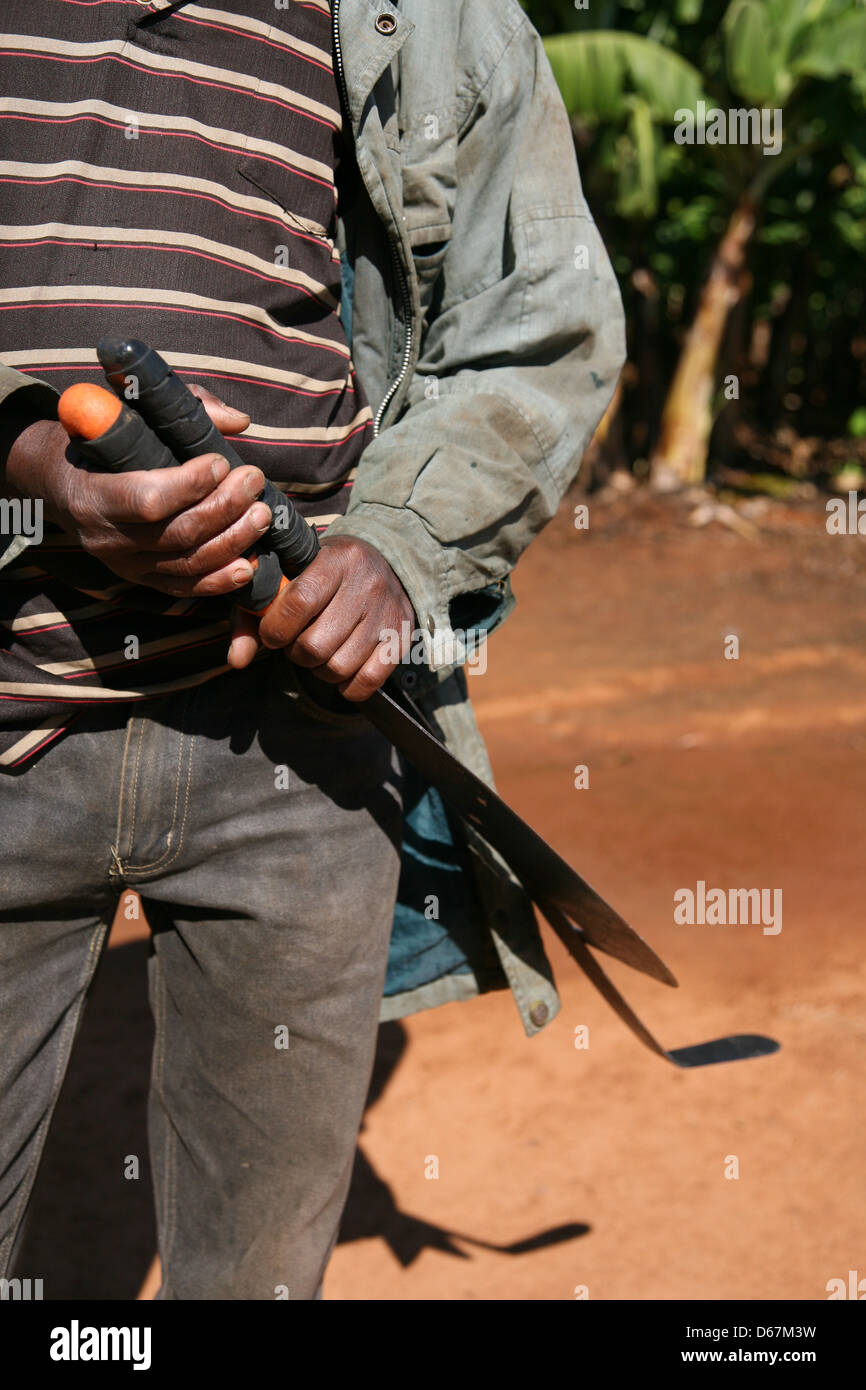 male African hand holding tools Stock Photo - Alamy