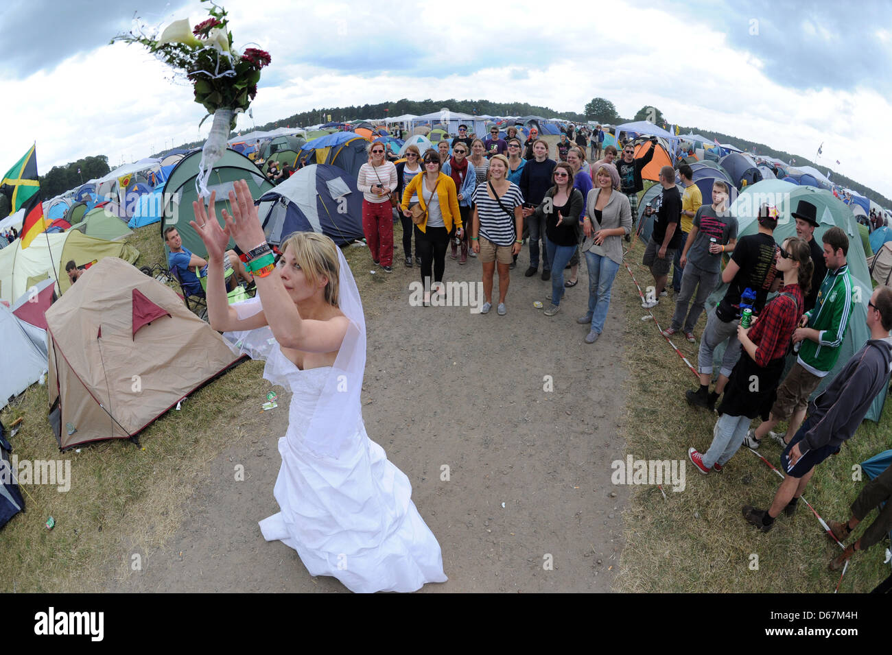Newly married Janina Poltrock dressed in her wedding dress ...