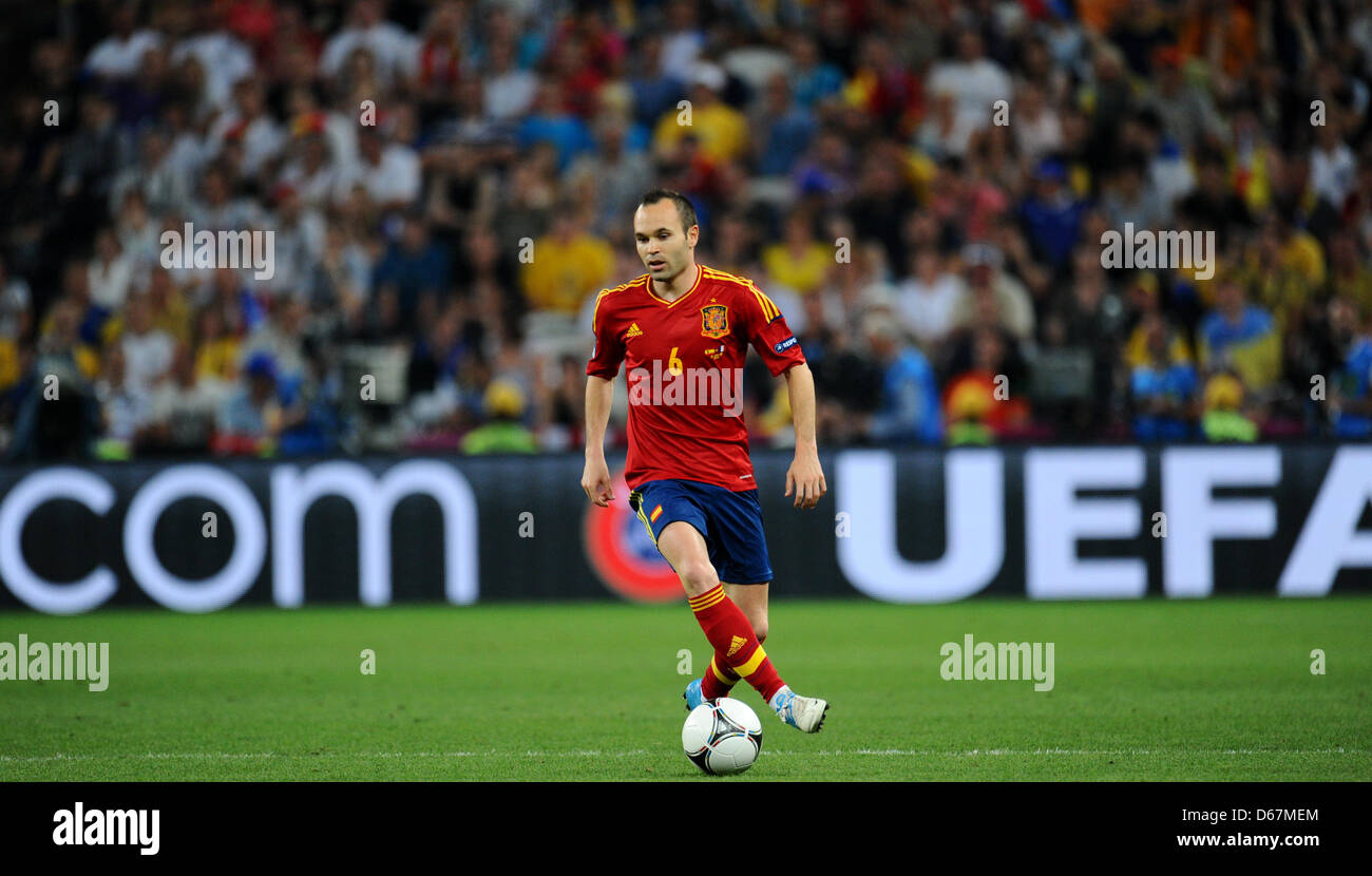 Spain's Andres Iniesta controls the ball gestures during the UEFA EURO ...