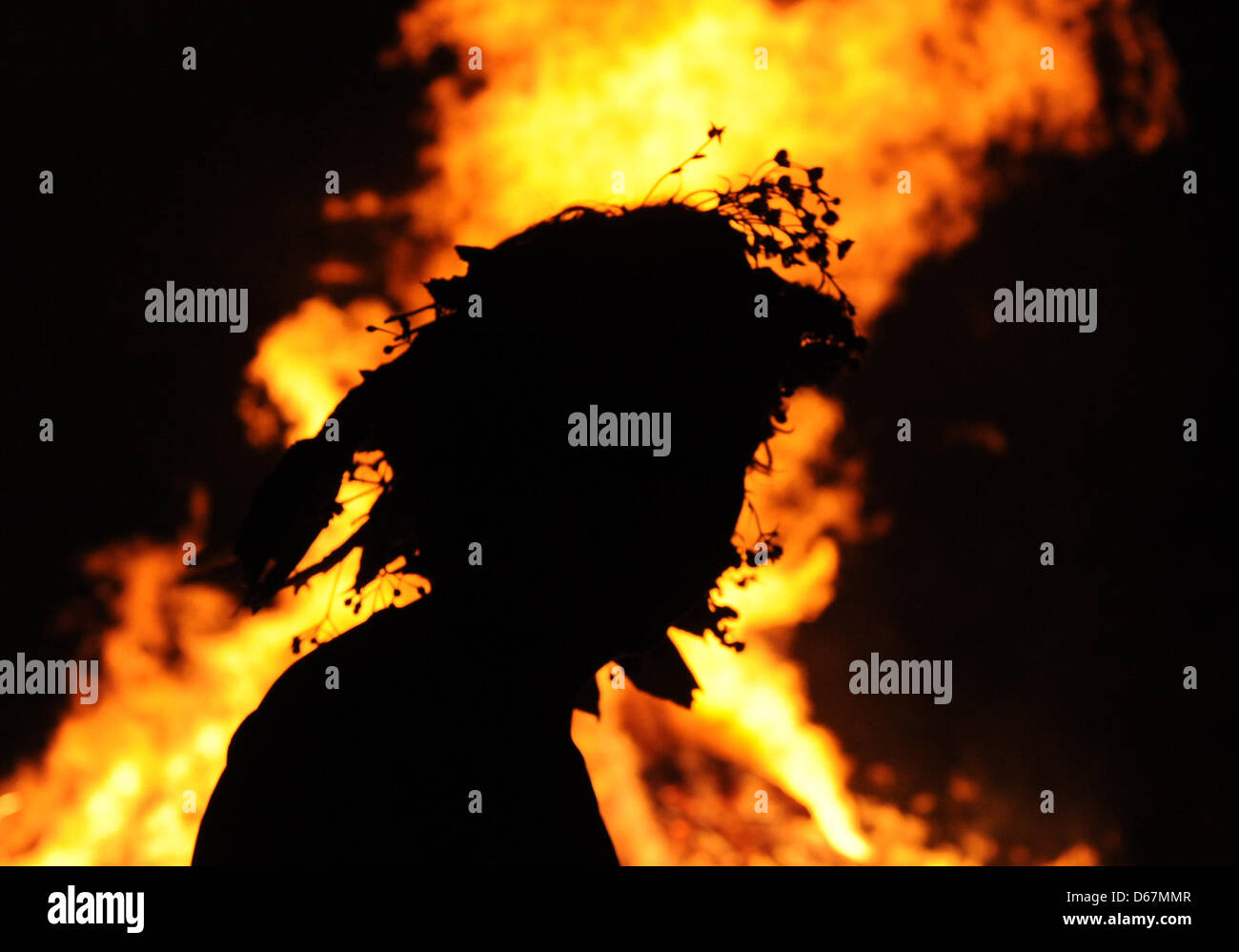 People dance around a midsummer fire in Freiburg, Germany, 23 June 2012 ...