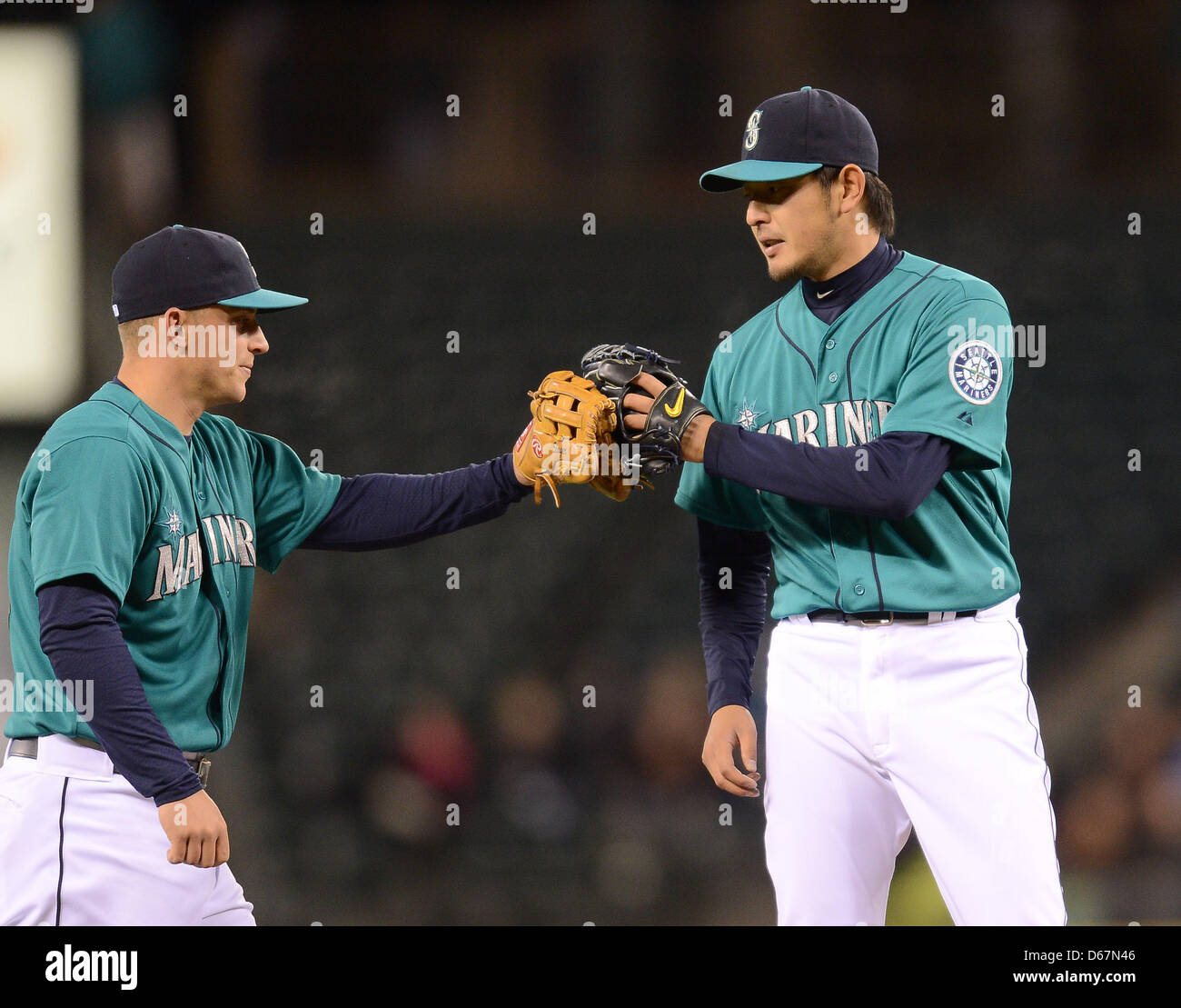 (L-R) Kyle Seager, Hisashi Iwakuma (Mariners), APRIL 12, 2013 - MLB ...