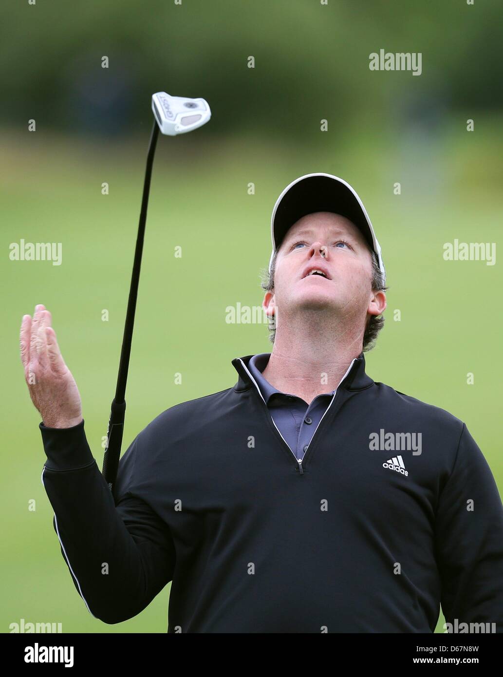 Australian golfer Marcus Fraser shows his disappointment after the ...