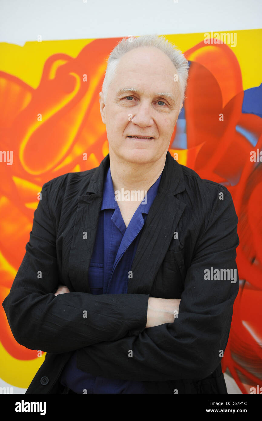 Painter David Reed poses for the camera in front of his paintings for ...