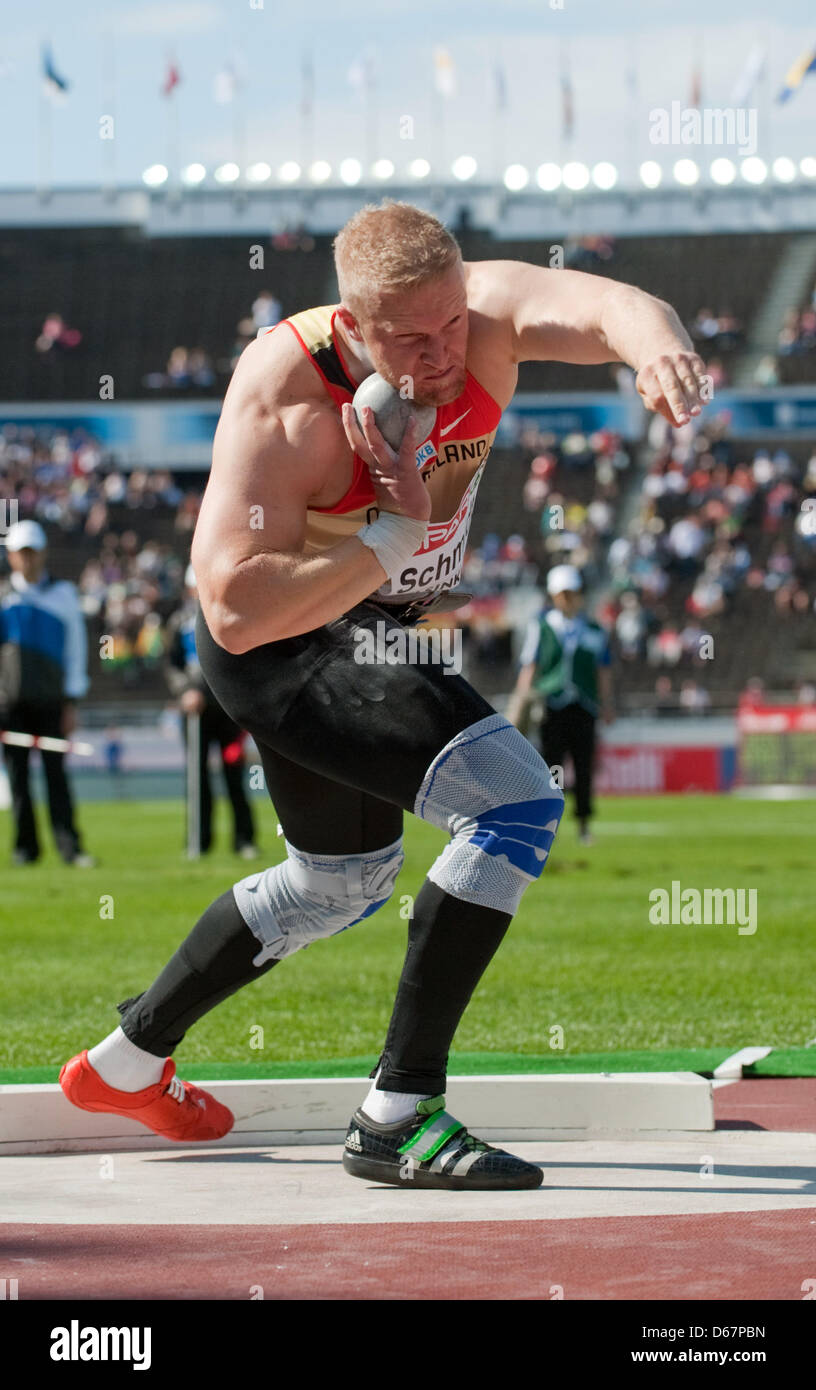 Germany's Marco Schmidt throws his shot in the Shot Put qualification ...