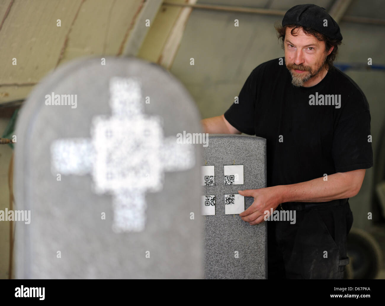 Stonemason Andreas Rosenkranz poses in his workshop in Cologne, Germany, 27 June 2012. The ...