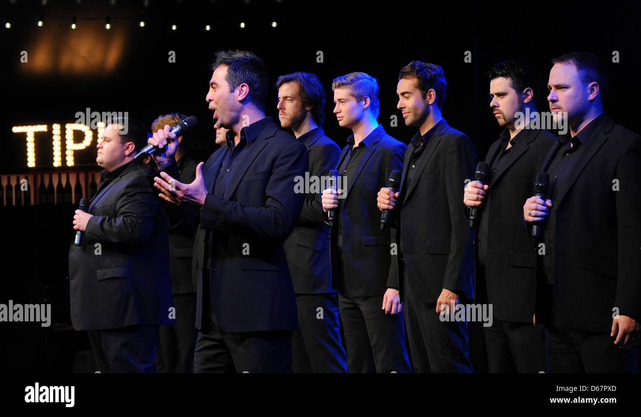 The international members of "The 12 Tenors" stand on the stage of ...