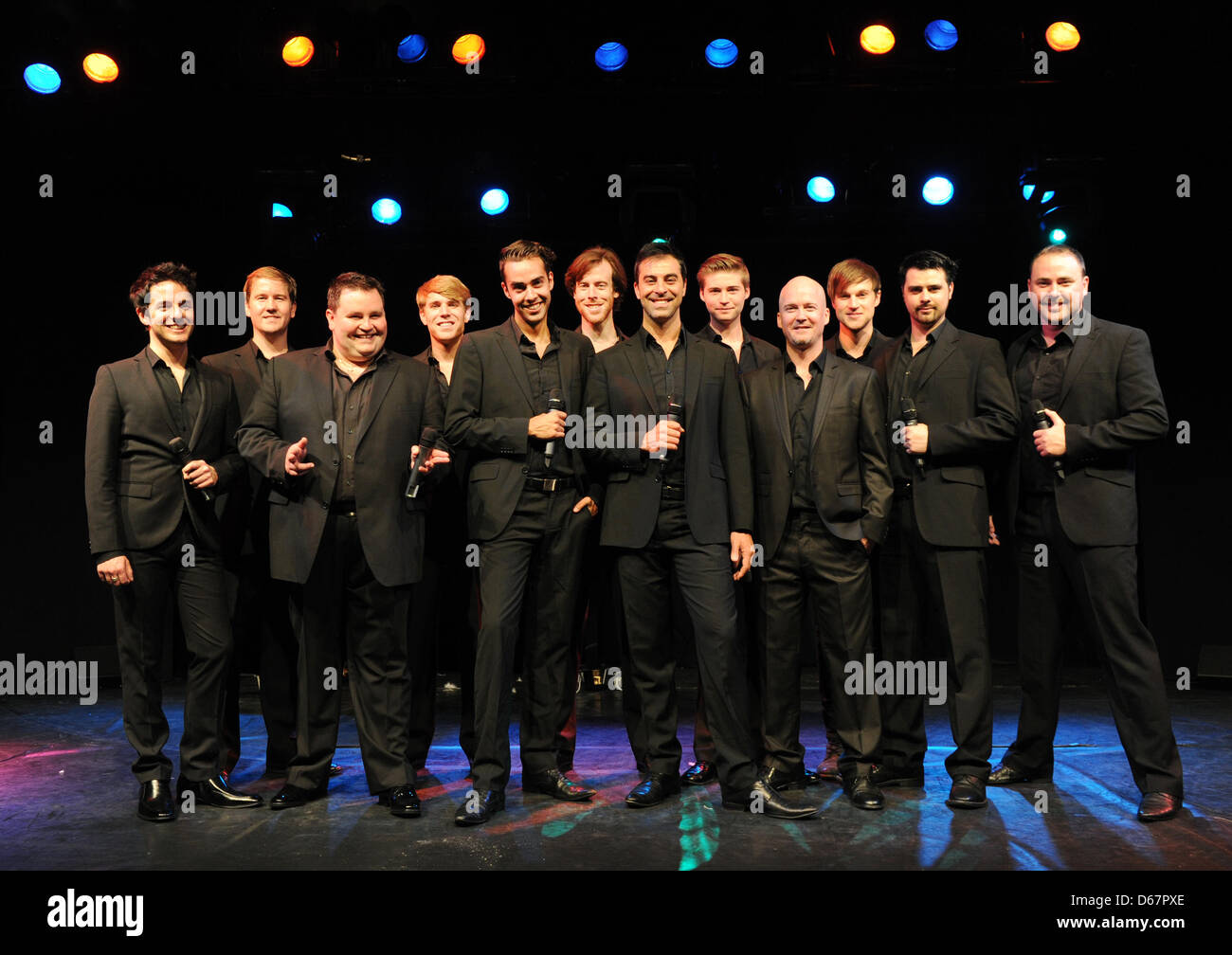 The international members of "The 12 Tenors" stand on the stage of ...