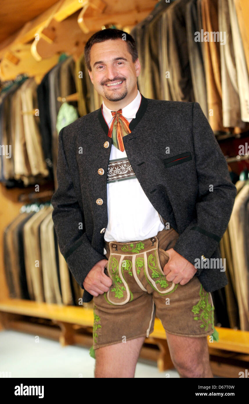 Former tobogganist Georg hackel wears a jacket from his collection ...
