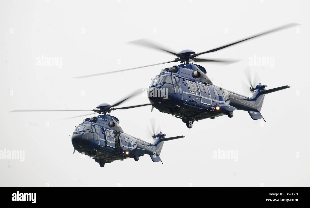 Two Eurocopter AS 332 Super Puma helicopters take part in an exercise ...