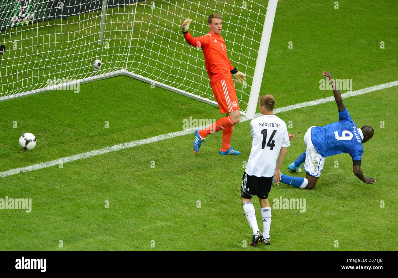 Italy's Mario Balotelli (R) celebrates after scoring 0-1 against ...