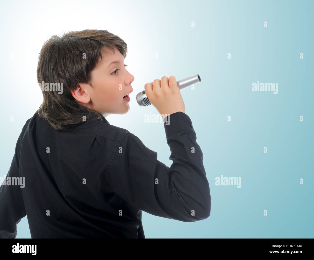 Little boy with microphone Stock Photo - Alamy