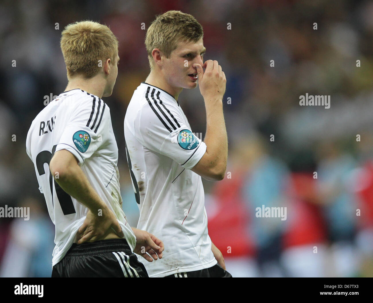 Germany's Marco Reus (L) and Toni Kroos react after the UEFA EURO 2012 ...